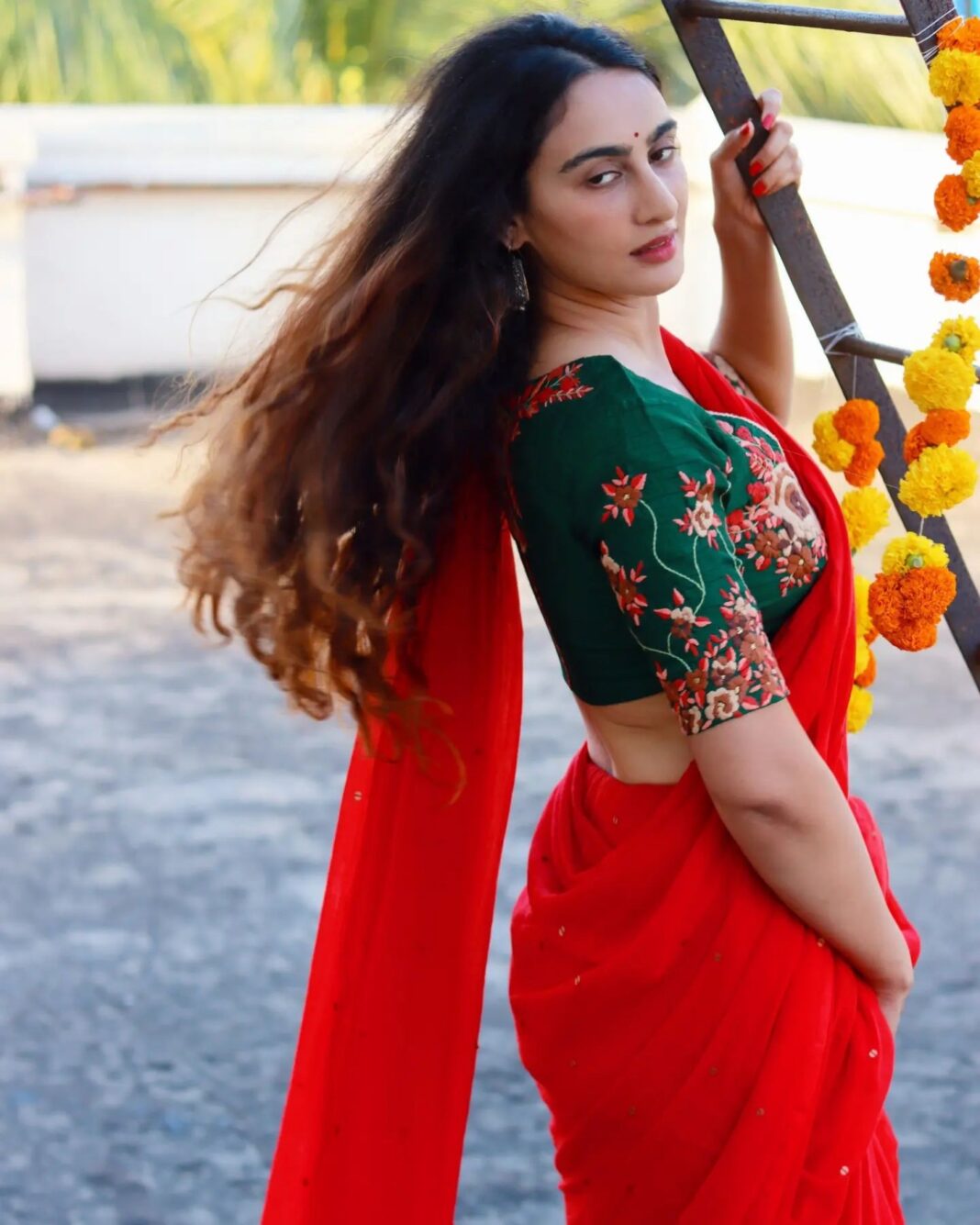 Megha Shukla beauty in traditional red saree - JSWTV.TV