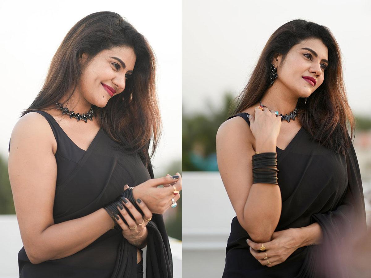Nivisha glamour shots in black saree - JSWTV.TV