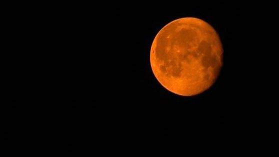 The strawberry moon illuminates the night sky; Here's why it is called ...